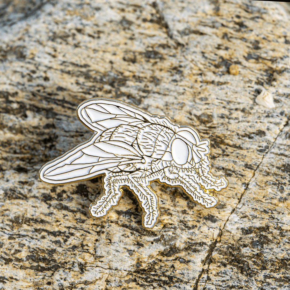 Whiteout Fly | Gold Club Pin